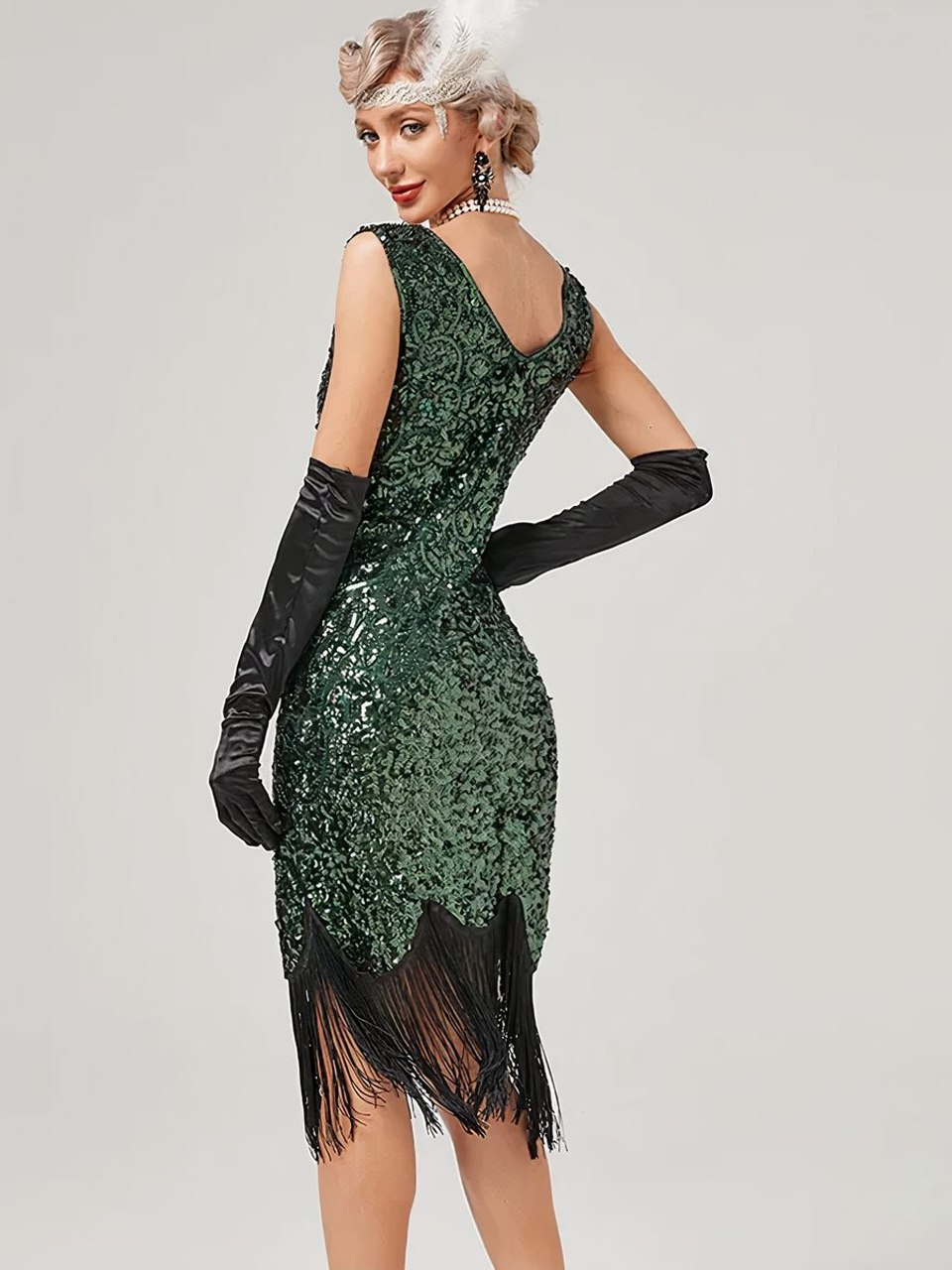 Robe années 20 entièrement pailletée et franges • Robe chic